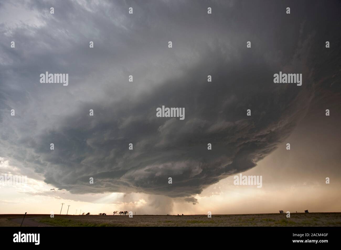 Tornadic supercell thunderstorm, with a partially rain-wrapped tornado ...