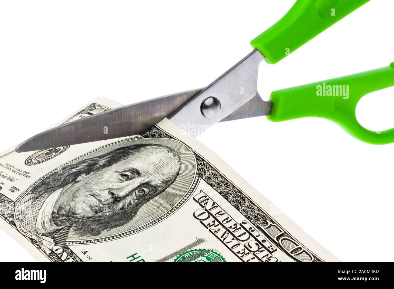 Dollar banknotes and scissors Stock Photo - Alamy
