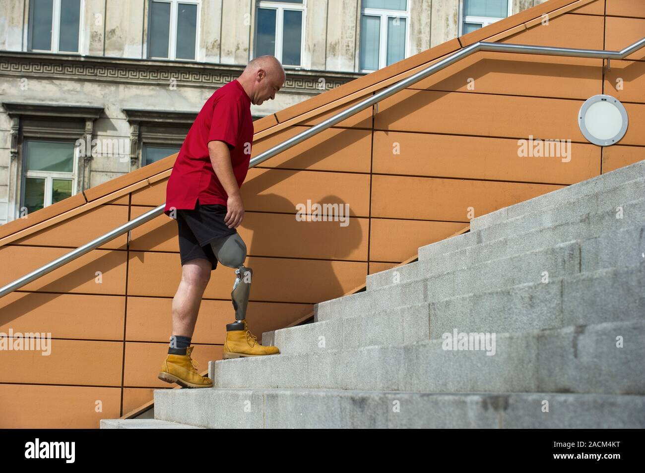Genium prosthetic leg. Amputee climbing stairs using a prosthetic leg ...