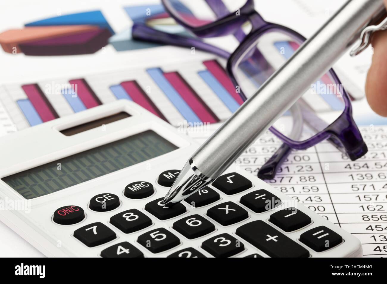 Calculators and Key Figures Stock Photo - Alamy
