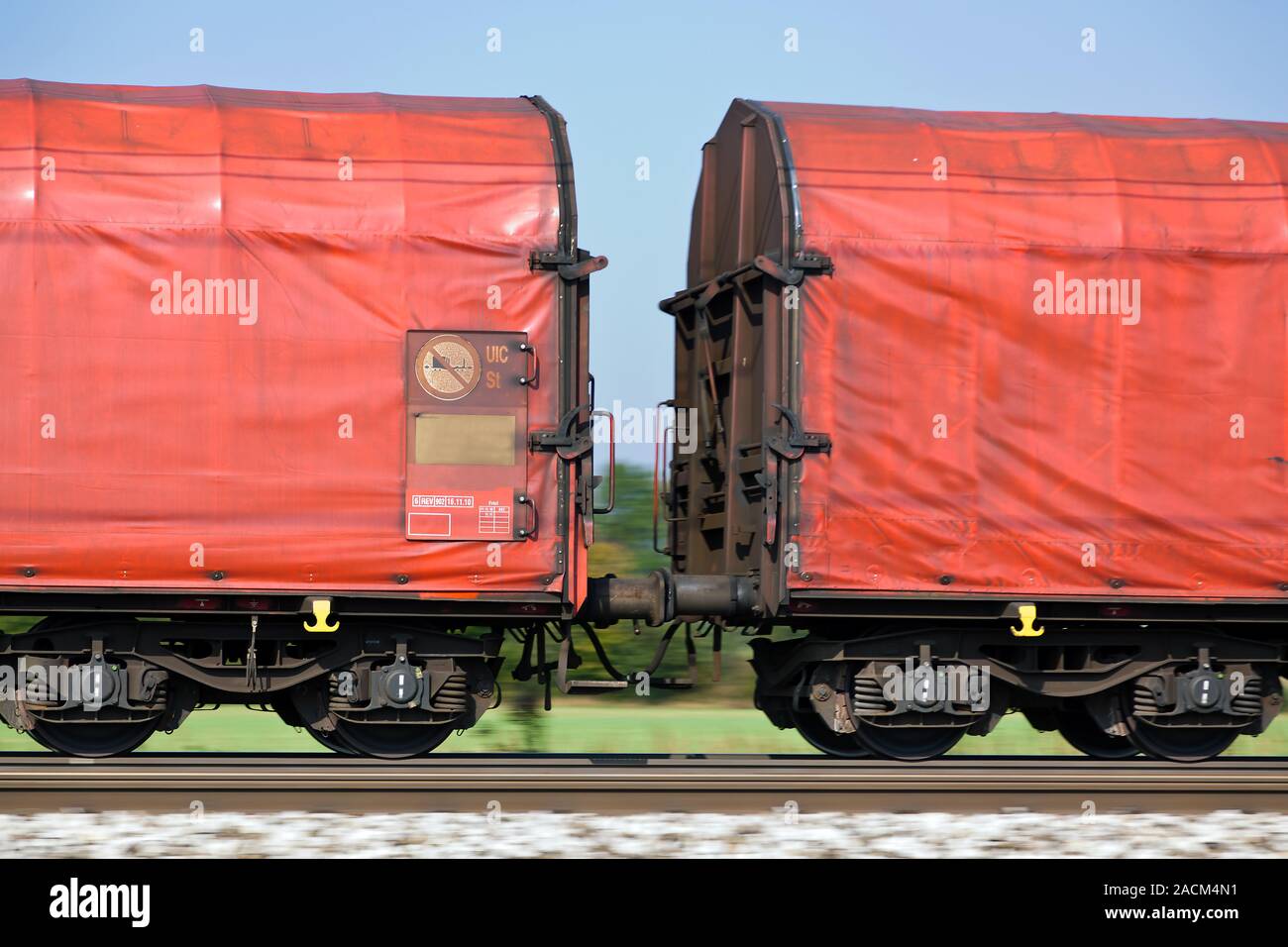 Freight train on rails Stock Photo - Alamy