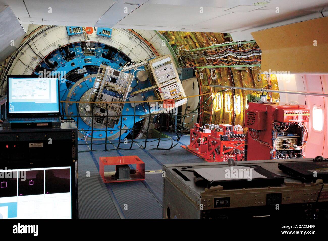 SOFIA airborne observatory installed in its 747SP aircraft. The mounting structure (blue) is at ...