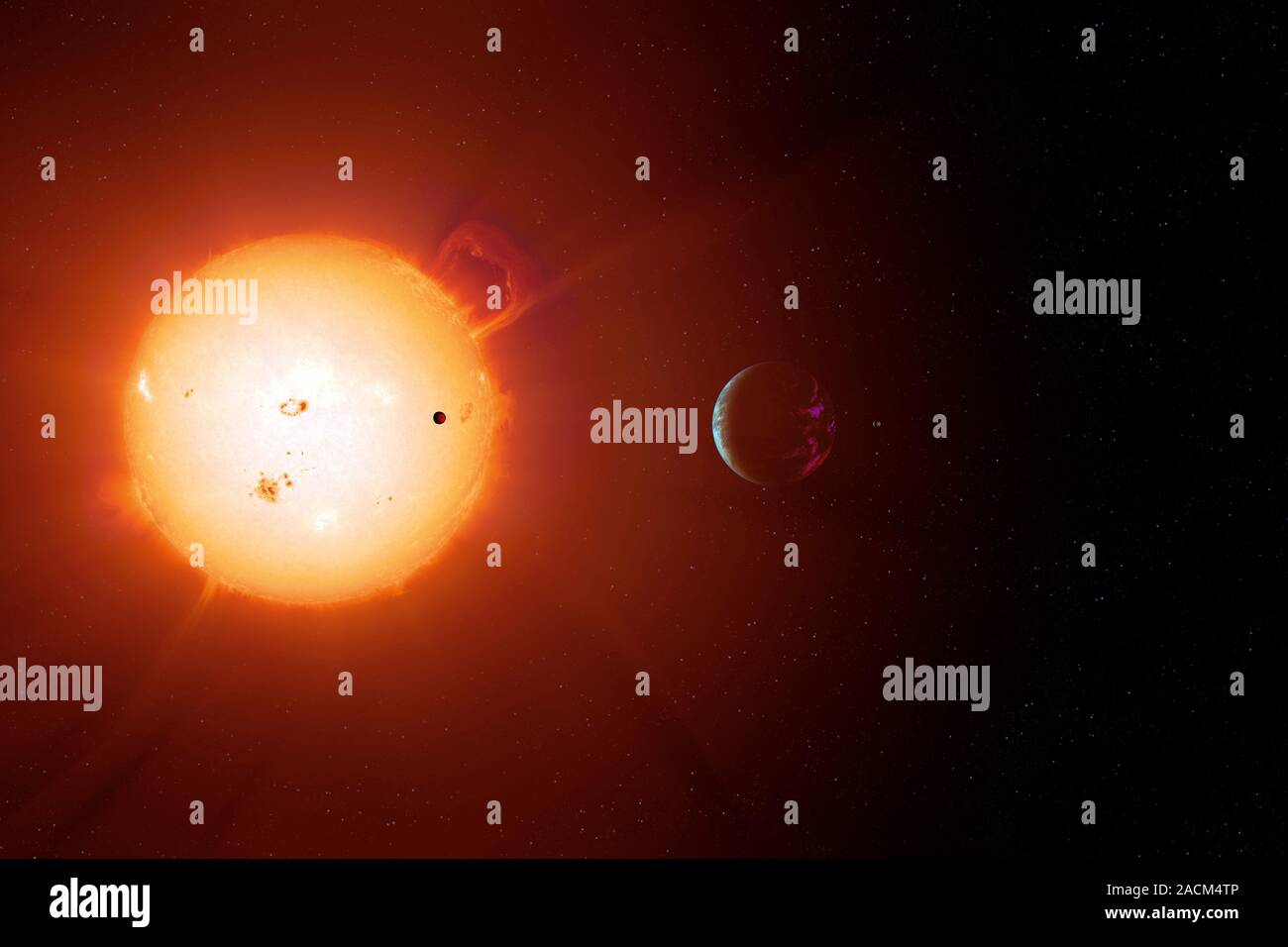 Alien planetary system. Artwork of an extrasolar Earth-like planet ...