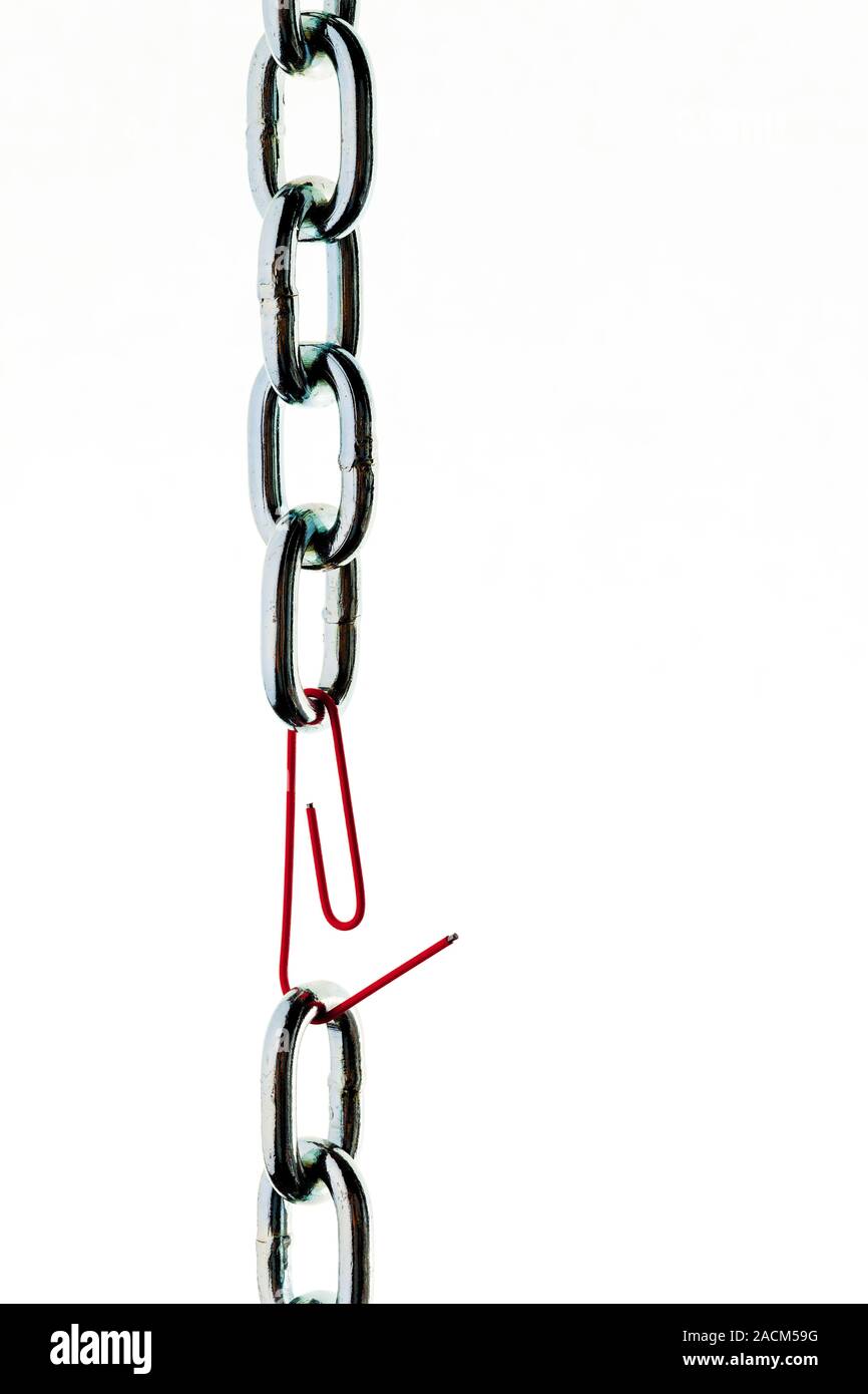 The steel chain is connected by a paper clip Stock Photo - Alamy