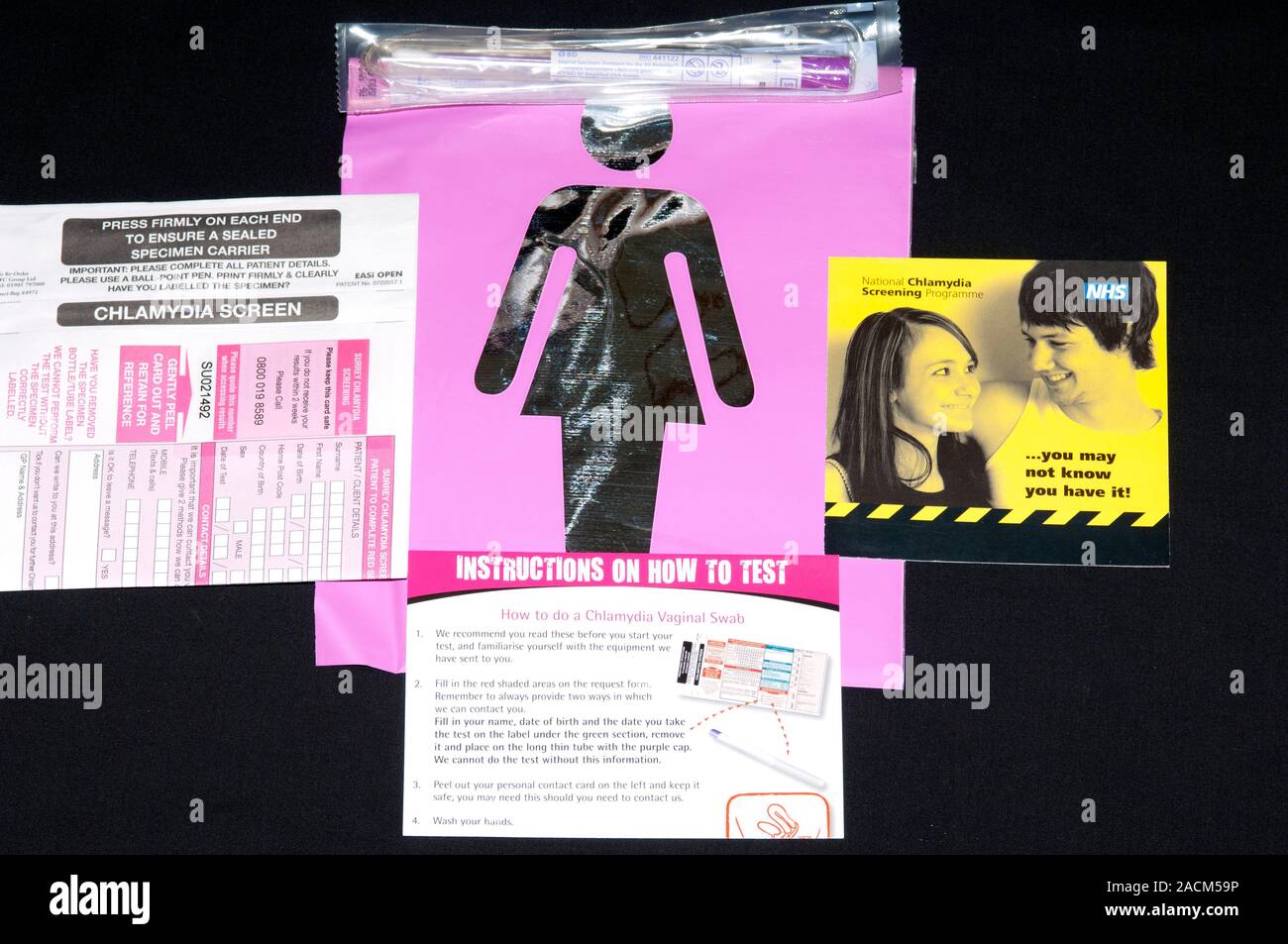 A female Chlamydia self-testing kit to detect Chlamydia infection, a ...