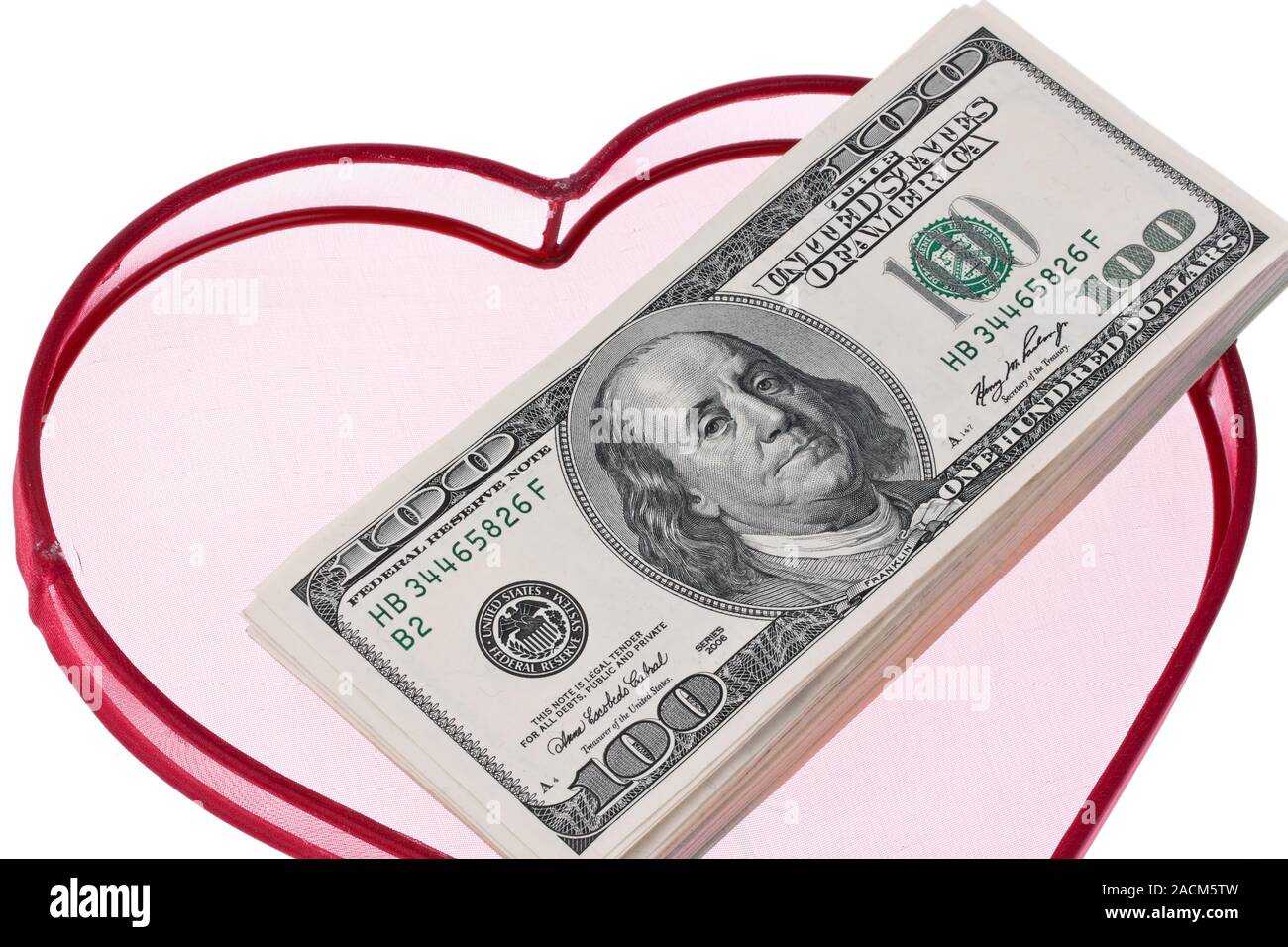 Dollar banknotes in a heart Stock Photo - Alamy