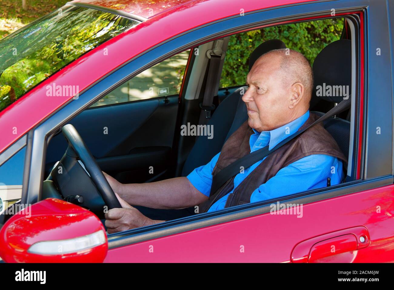 Senior driver in the car Stock Photo - Alamy