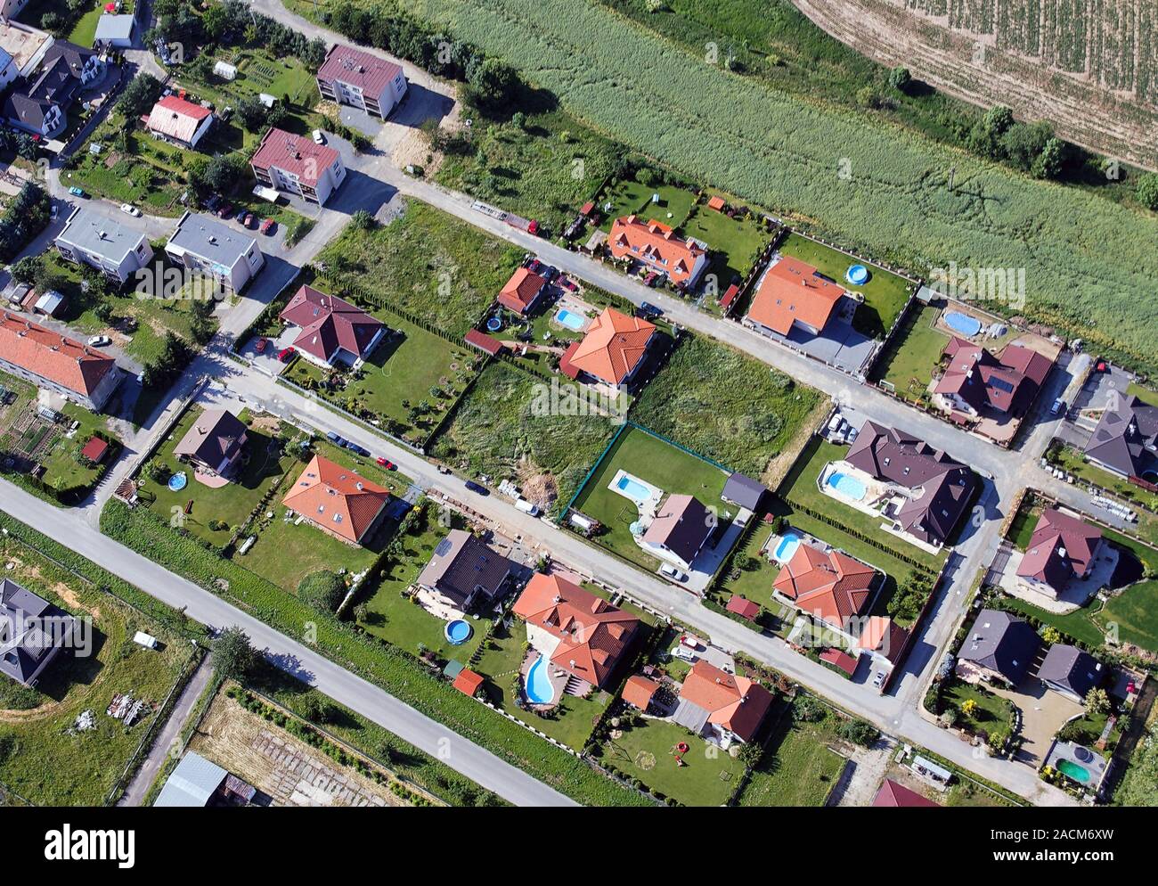 Housing estate with detached houses Stock Photo - Alamy