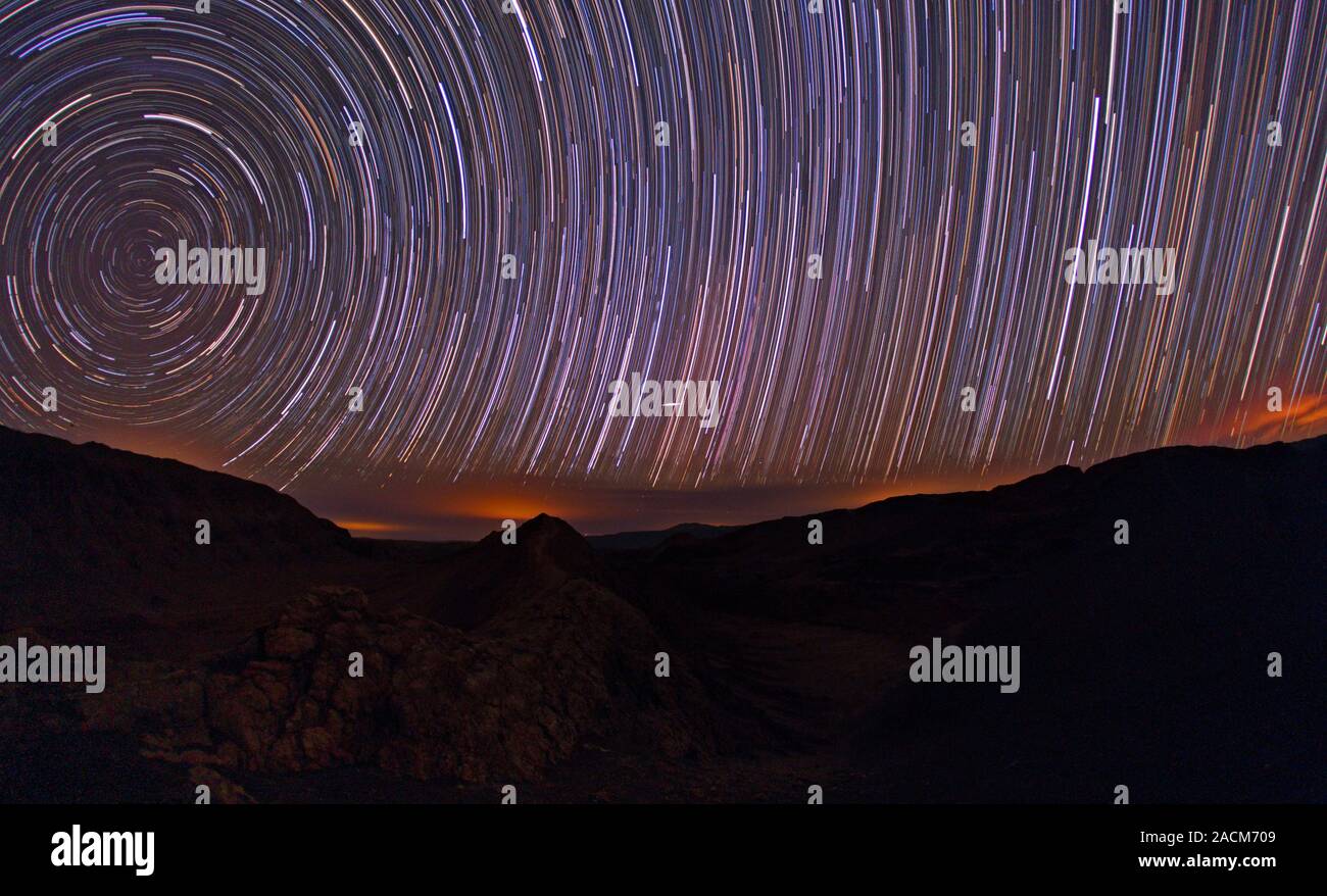 Atacama night sky, time-exposure image. Star trails over the Valley of ...