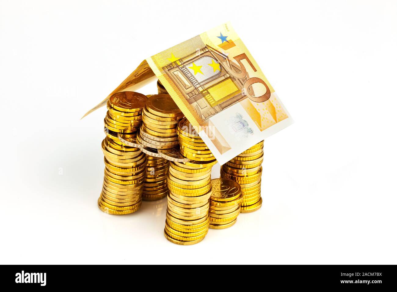 Money house from coins hi-res stock photography and images - Alamy