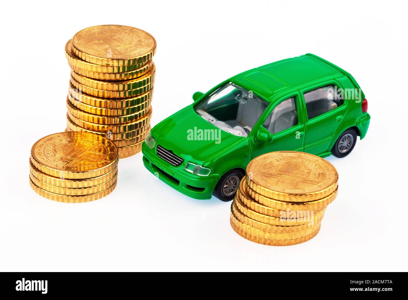 Model car and coins. car costs Stock Photo - Alamy