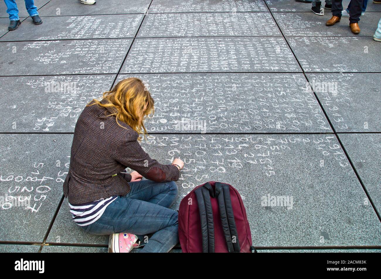 Calculation task on a road pavement Stock Photo - Alamy