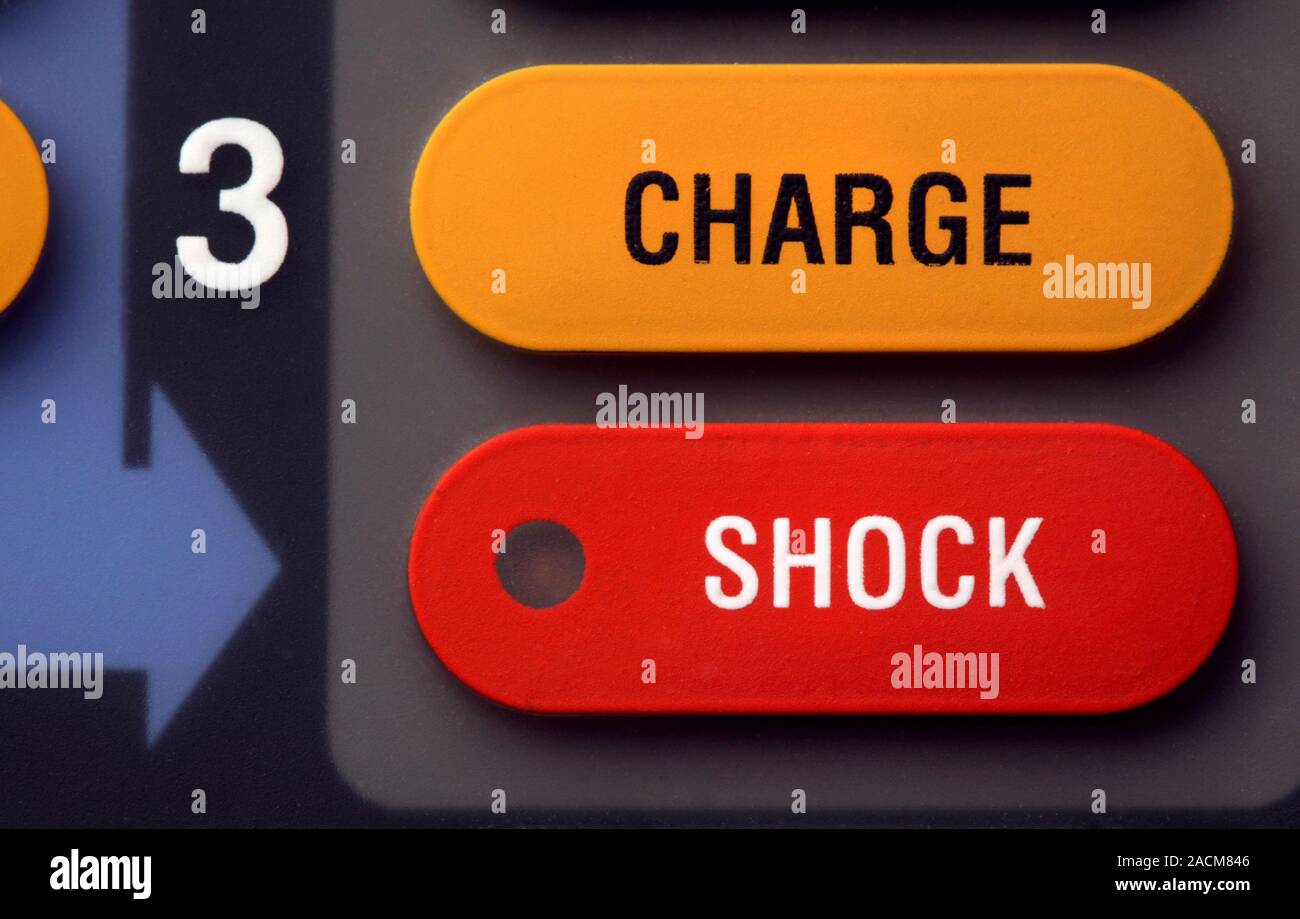 Charge and shock buttons on a defibrillator control panel. A ...