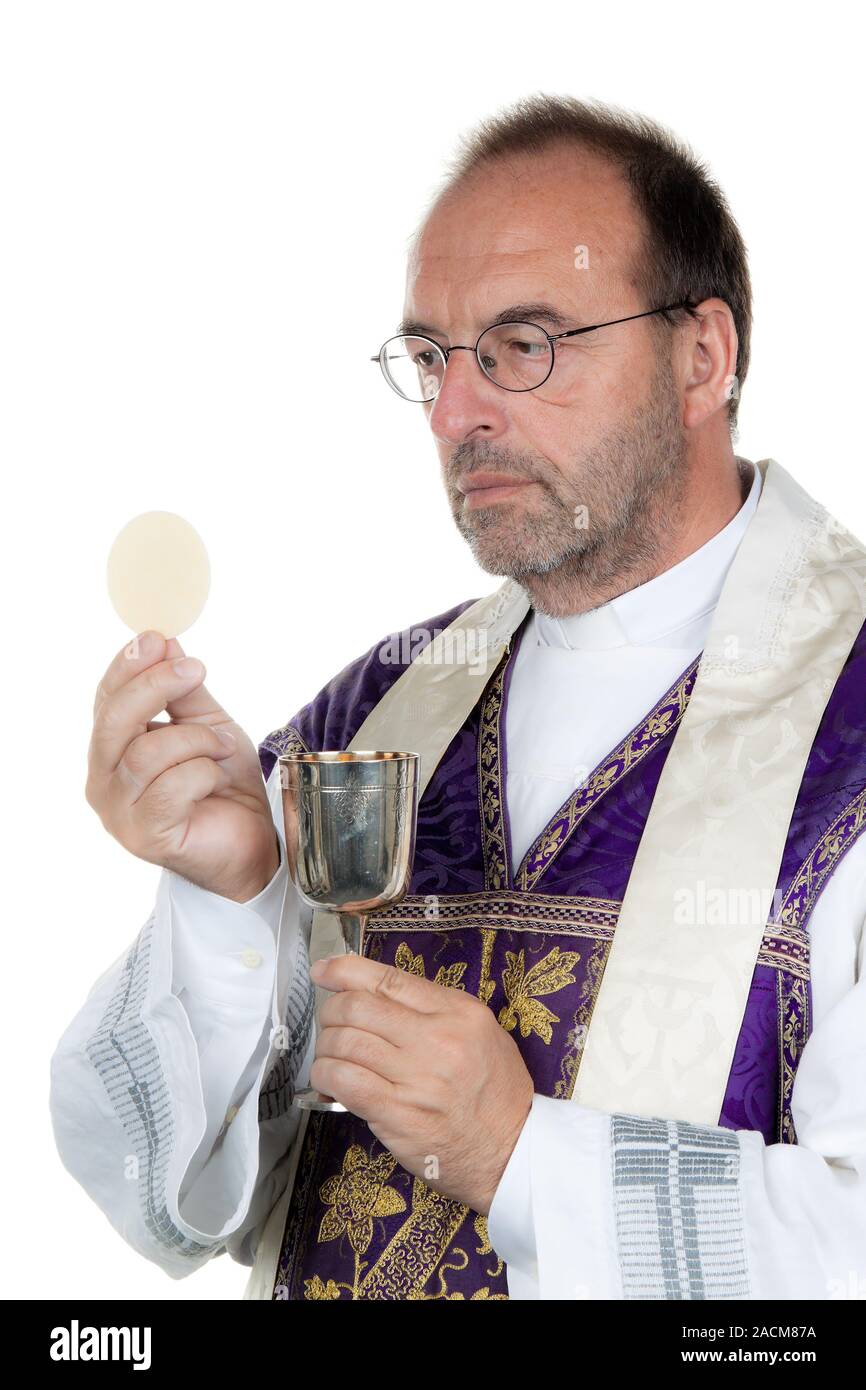 Catholic priest with goblet Stock Photo - Alamy