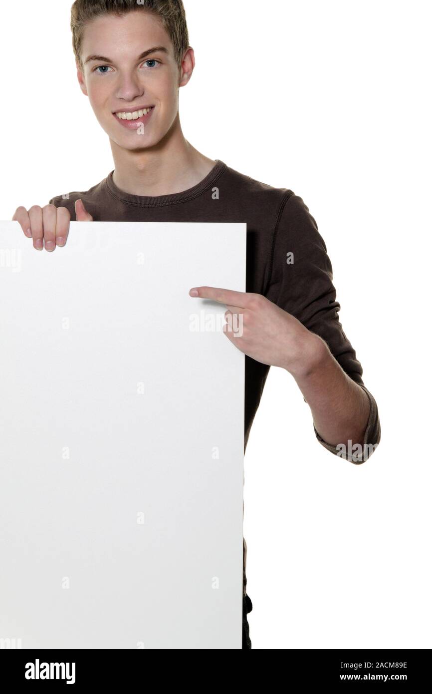 Young man with empty poster Stock Photo - Alamy