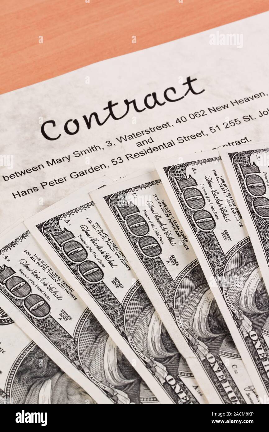Dollar banknotes and English contract Stock Photo - Alamy