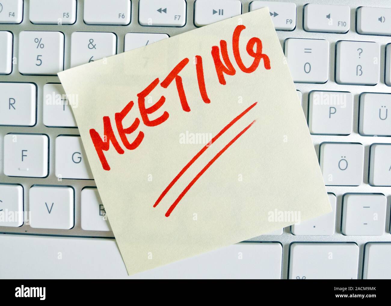 Note on Computer Keyboard: Meeting Stock Photo - Alamy