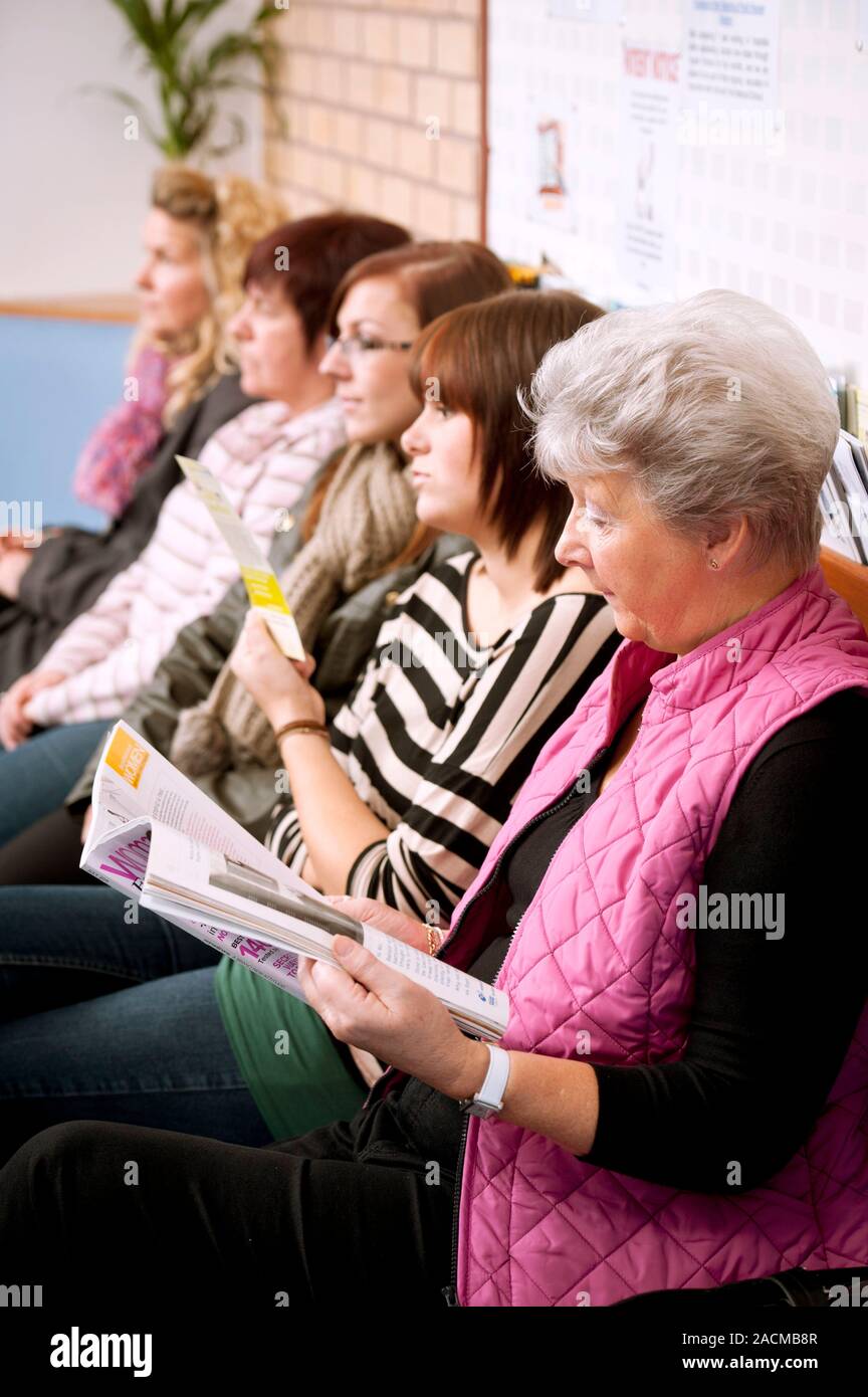 Waiting room. Women reading in a waiting room Stock Photo - Alamy