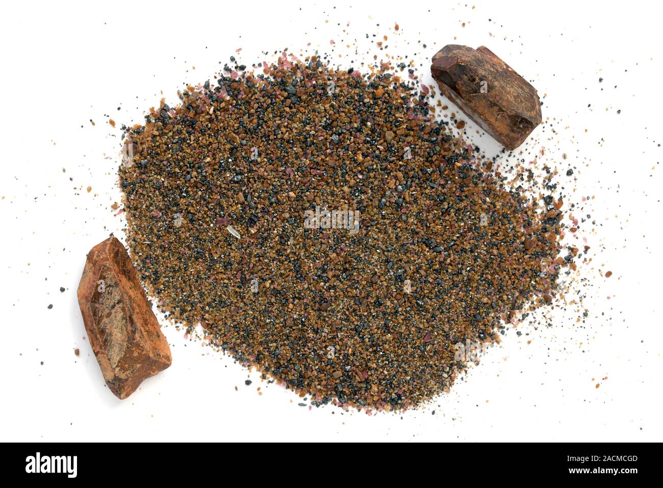 Monazite crystals and sand. Monazite is a rare earth phosphate mineral ...