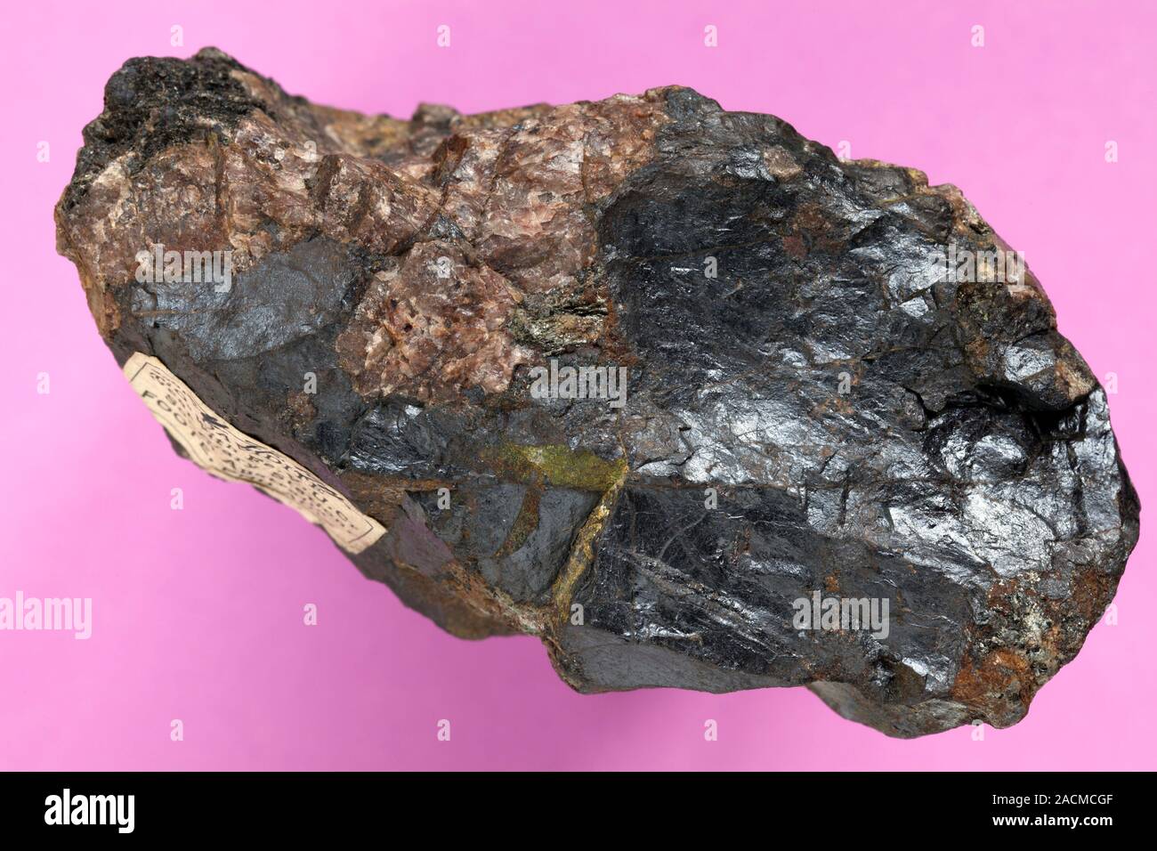 Davidite samples. Davidite (glossy black area at right) is an oxide of ...