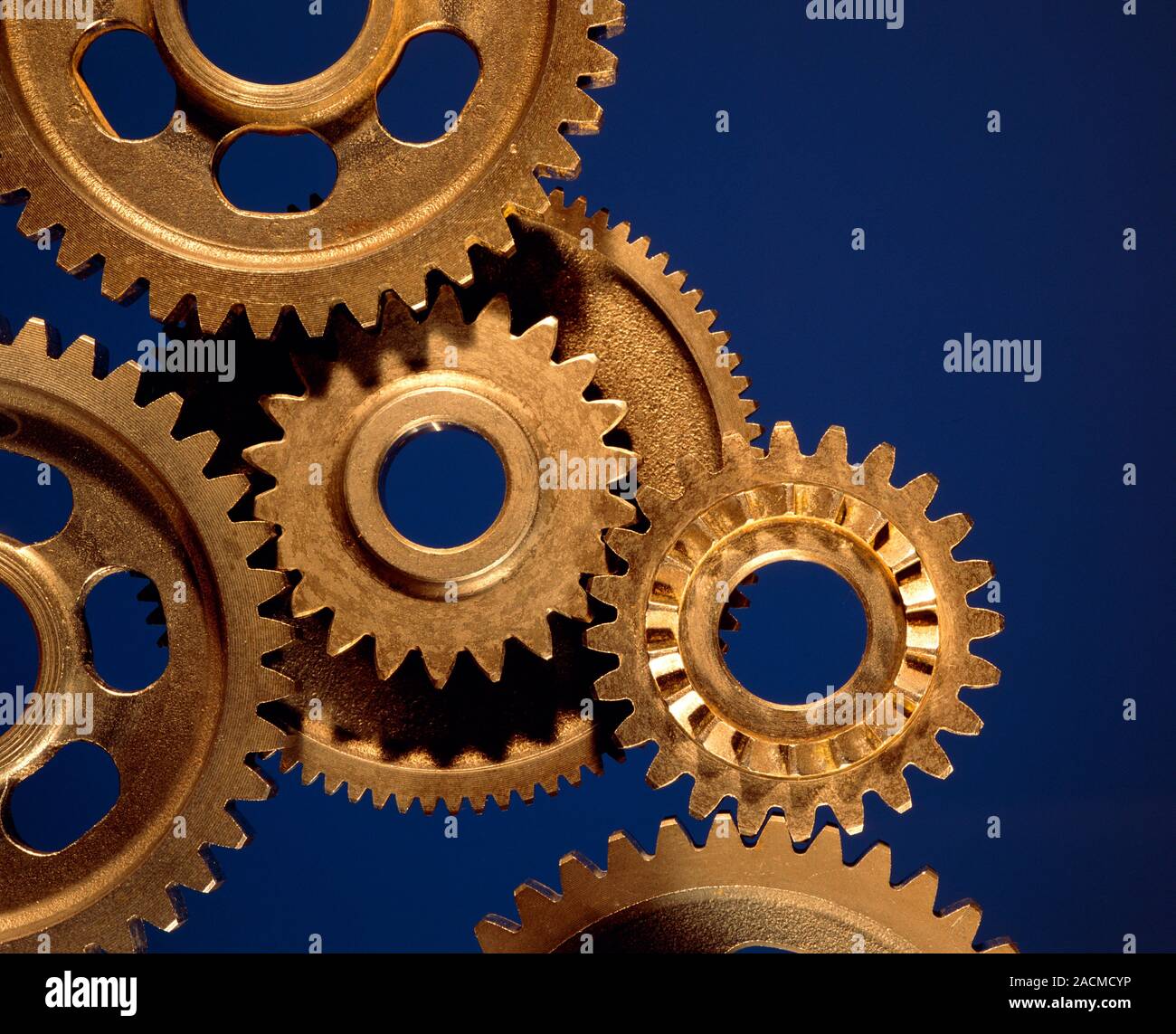 Gear wheels, or cogs, transmit rotational force within machines Stock ...