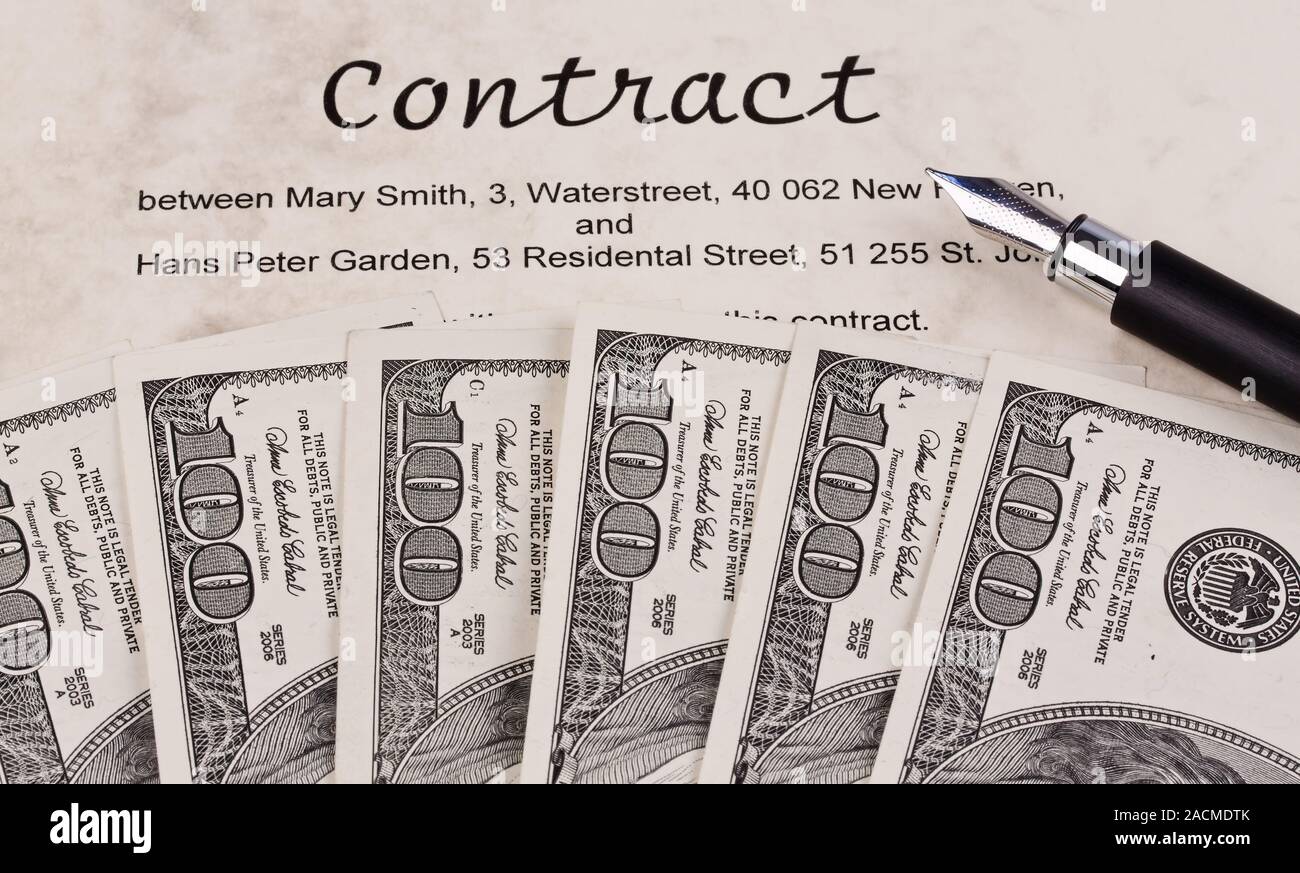 Dollar banknotes and English contract Stock Photo - Alamy
