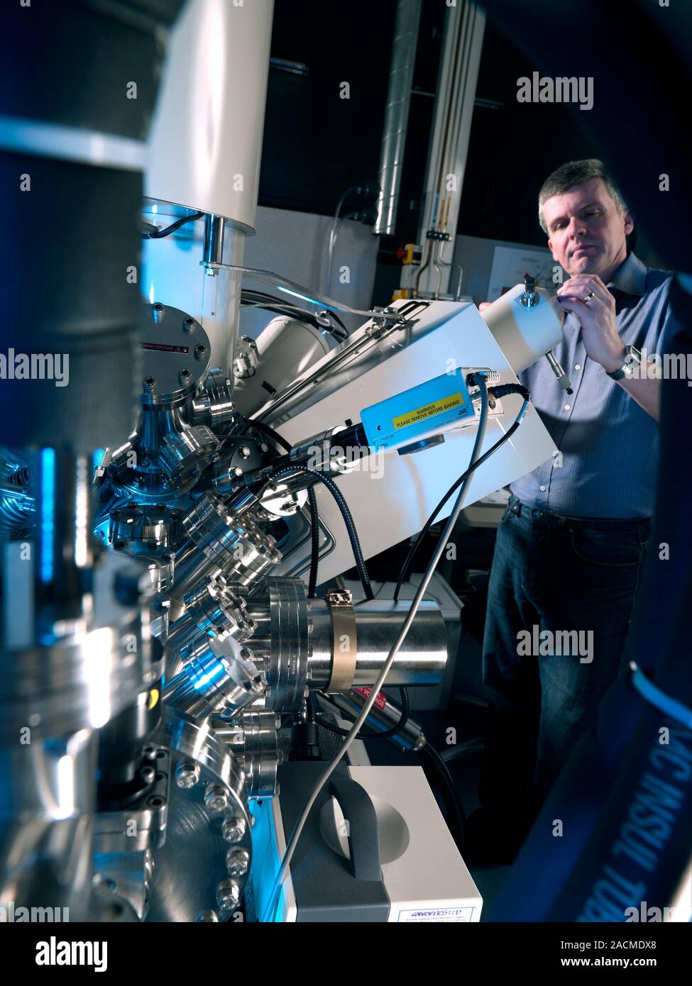 X-ray materials analysis equipment. Researcher using an X-ray ...