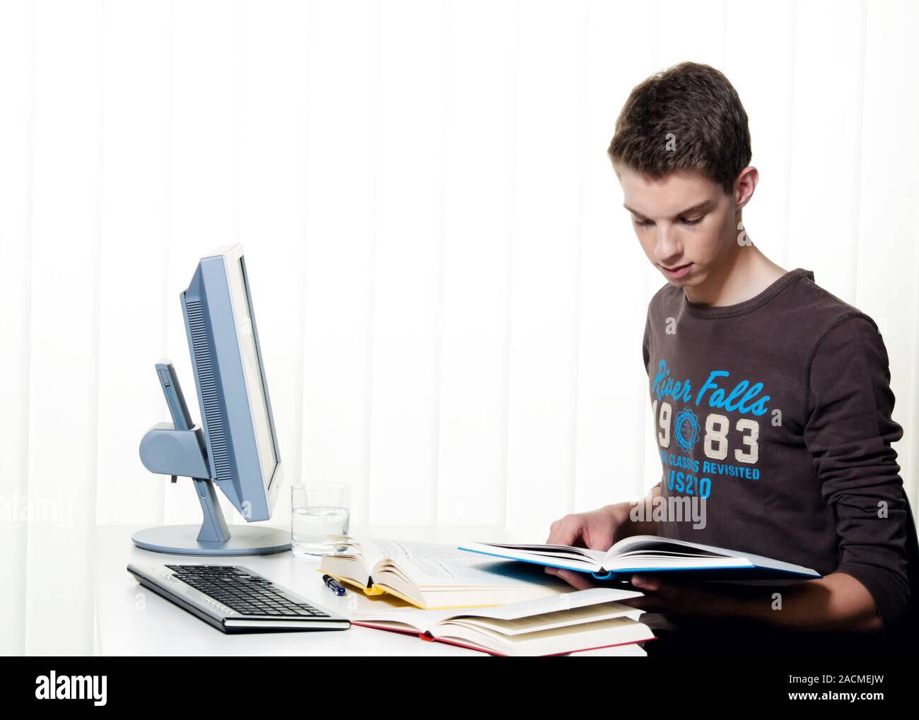 Young student learning Stock Photo - Alamy