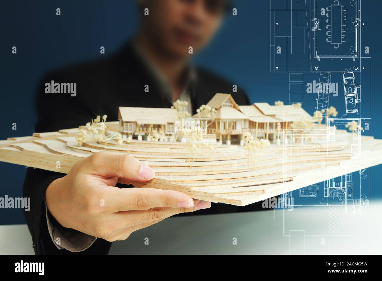 house model and show layout plan on touch screen Stock Photo - Alamy