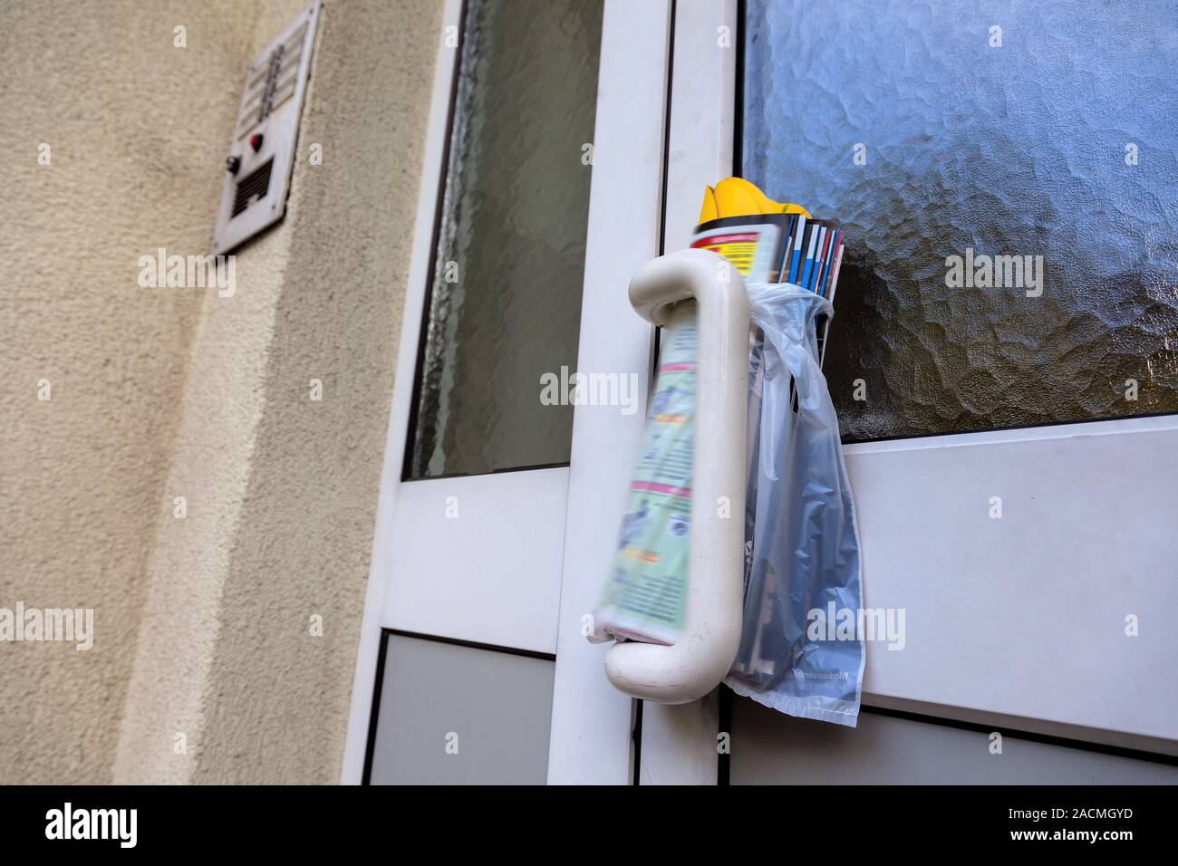 Advertising at the front door Stock Photo - Alamy