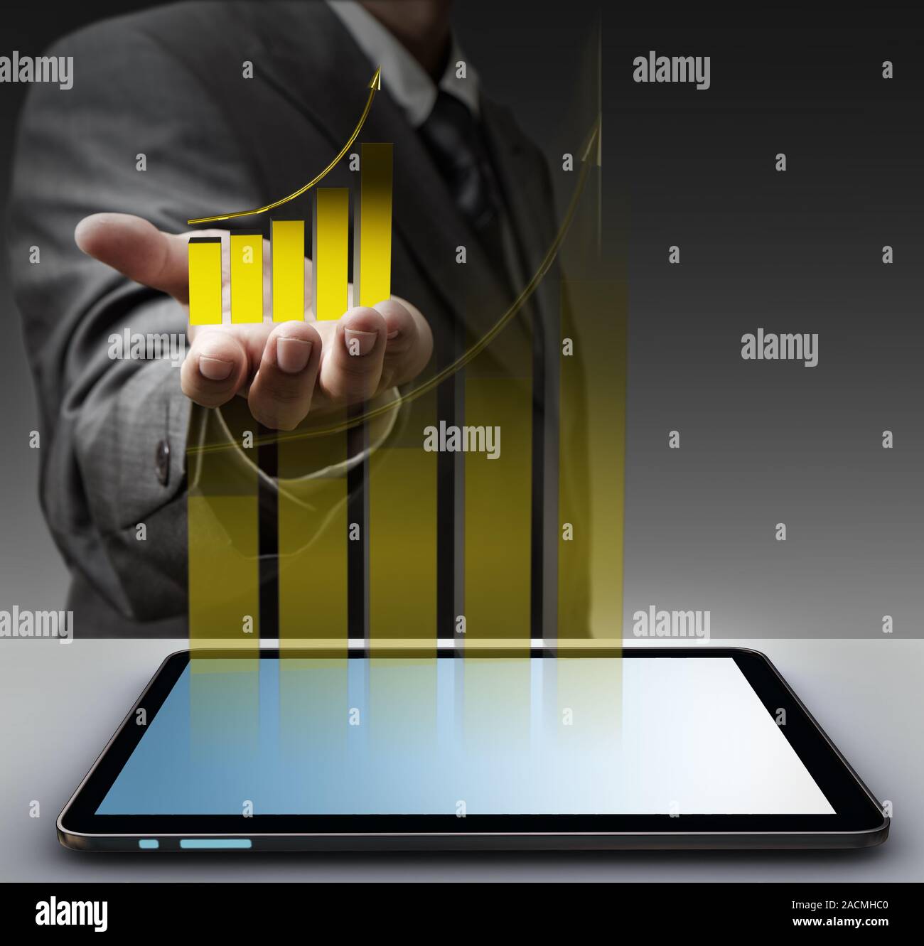 hand shows virtual gold graph with tablet computer Stock Photo - Alamy