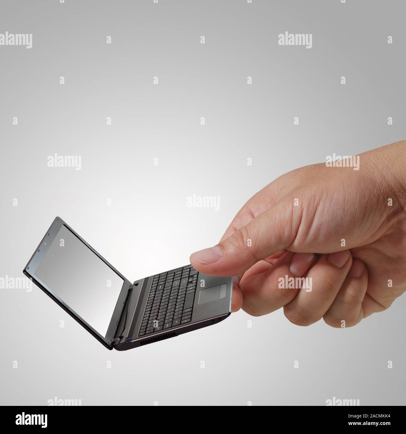 hand picks laptop Stock Photo - Alamy