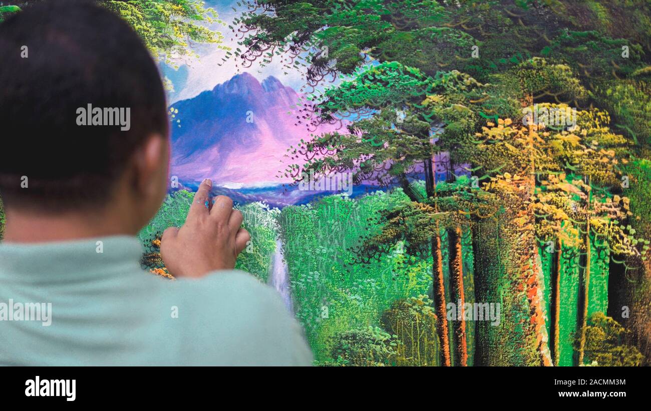 the painter who finish his art Stock Photo - Alamy