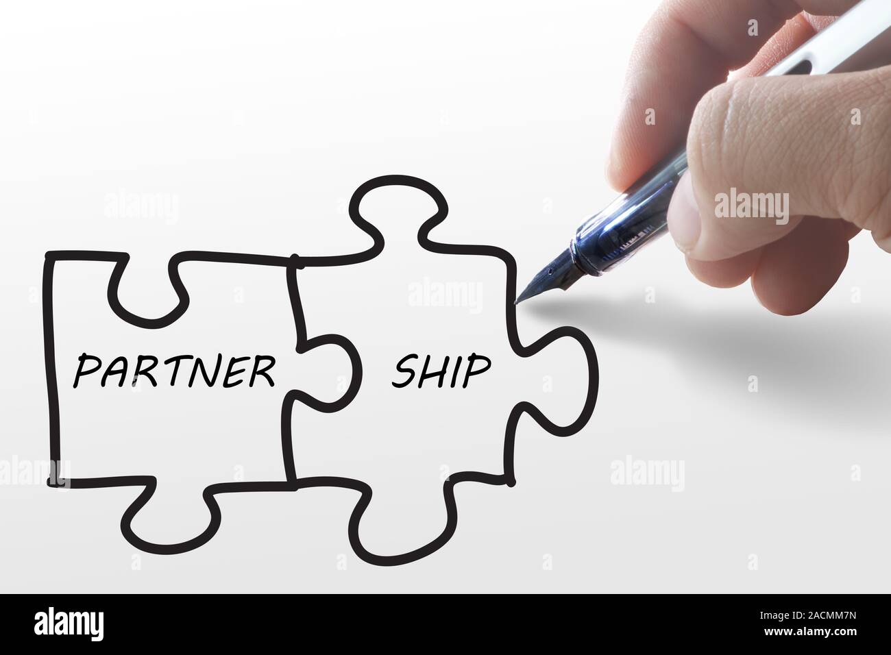 hand draw puzzles and partner ship on paper Stock Photo - Alamy