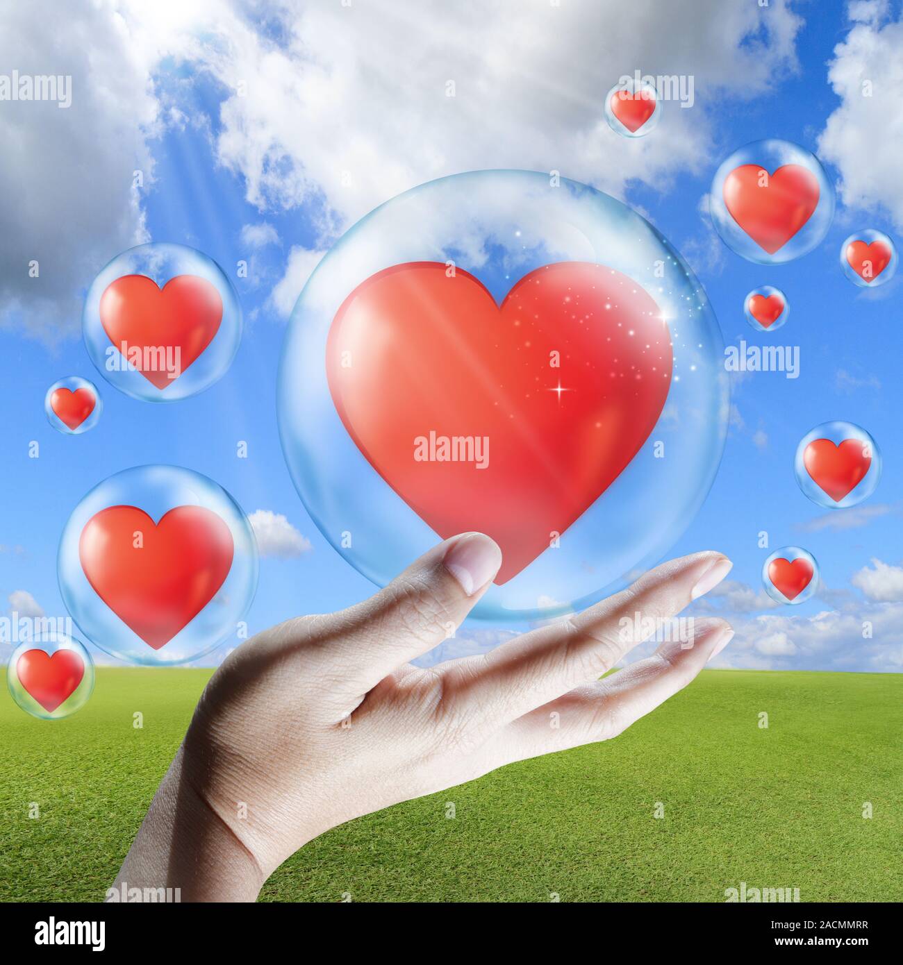 hand holds red heart in bubble Stock Photo - Alamy