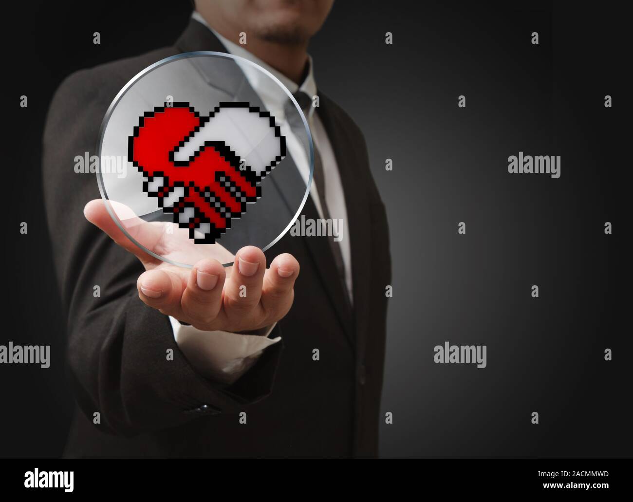 pixel hand shake heart shaped symbol as medical technology concept ...