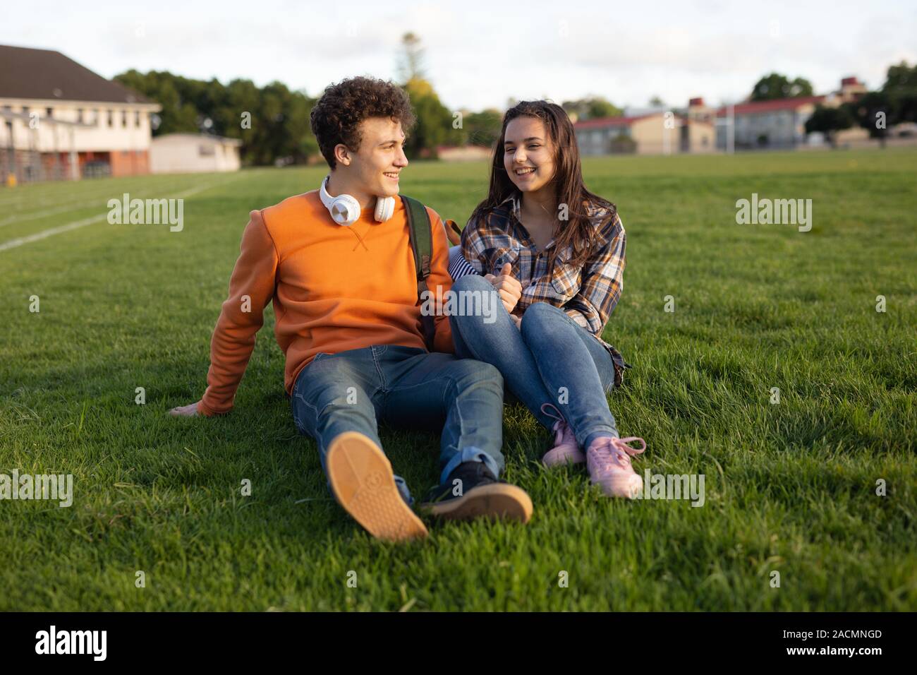 Teenagers hanging out in their school grounds Stock Photo - Alamy
