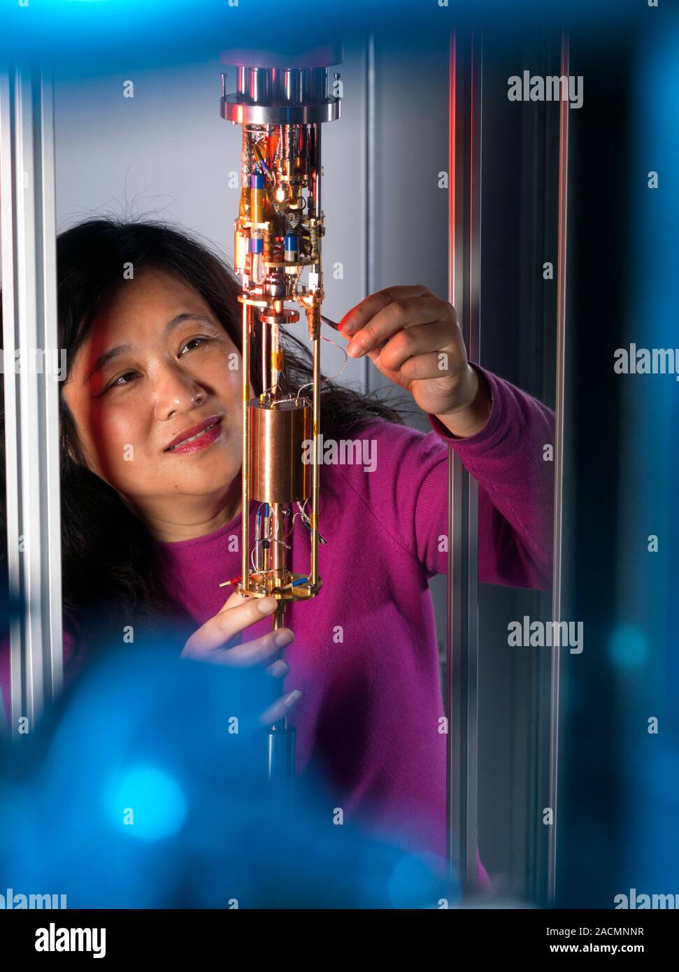 Photon Detection Researcher Adjusting Nanosquid Nanoscale