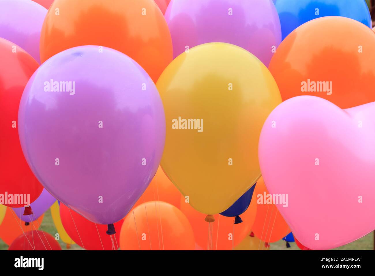 Colorful funny balloons Stock Photo - Alamy