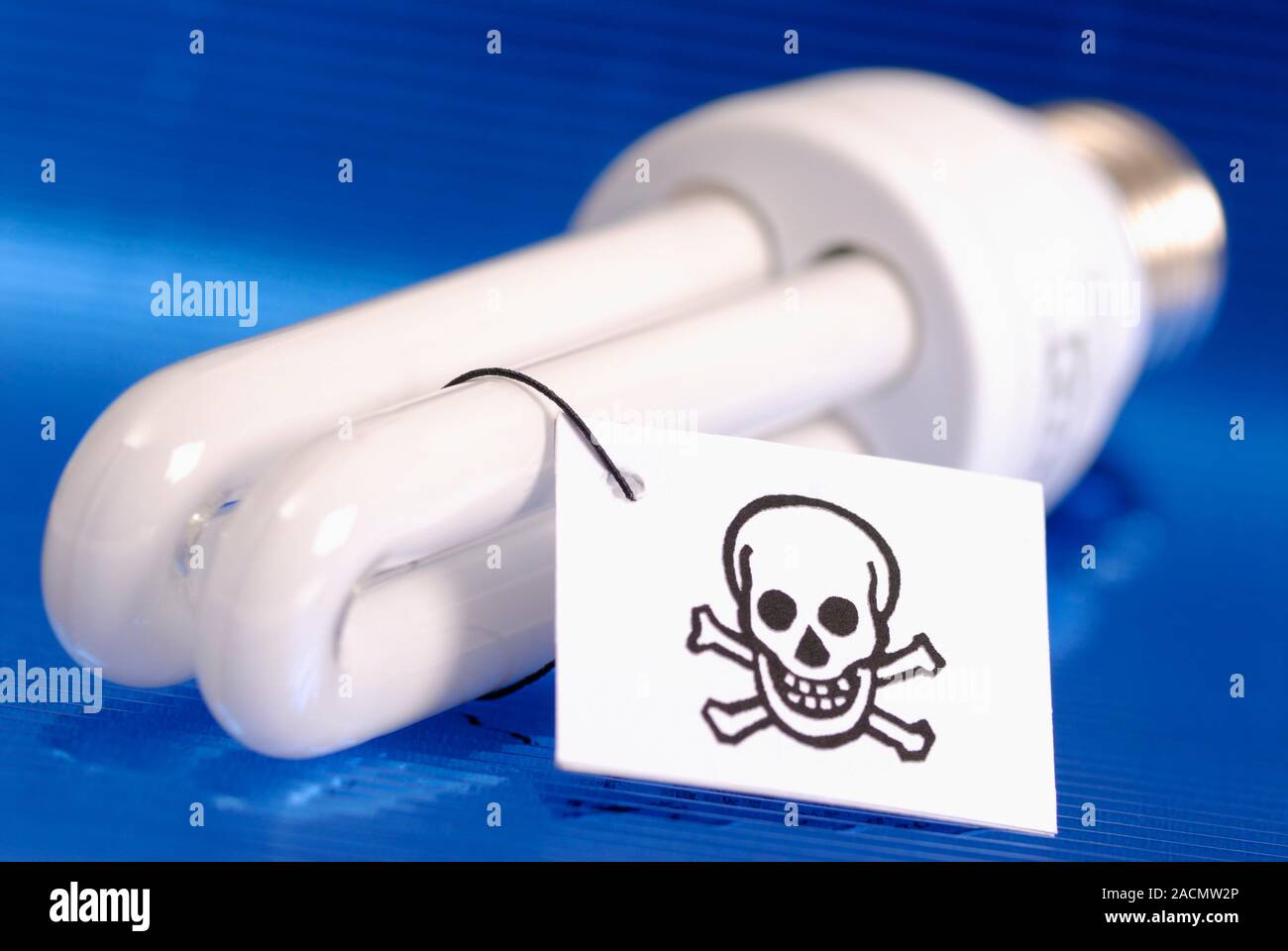 Toxic content of energy saving bulbs, conceptual image. Image ...