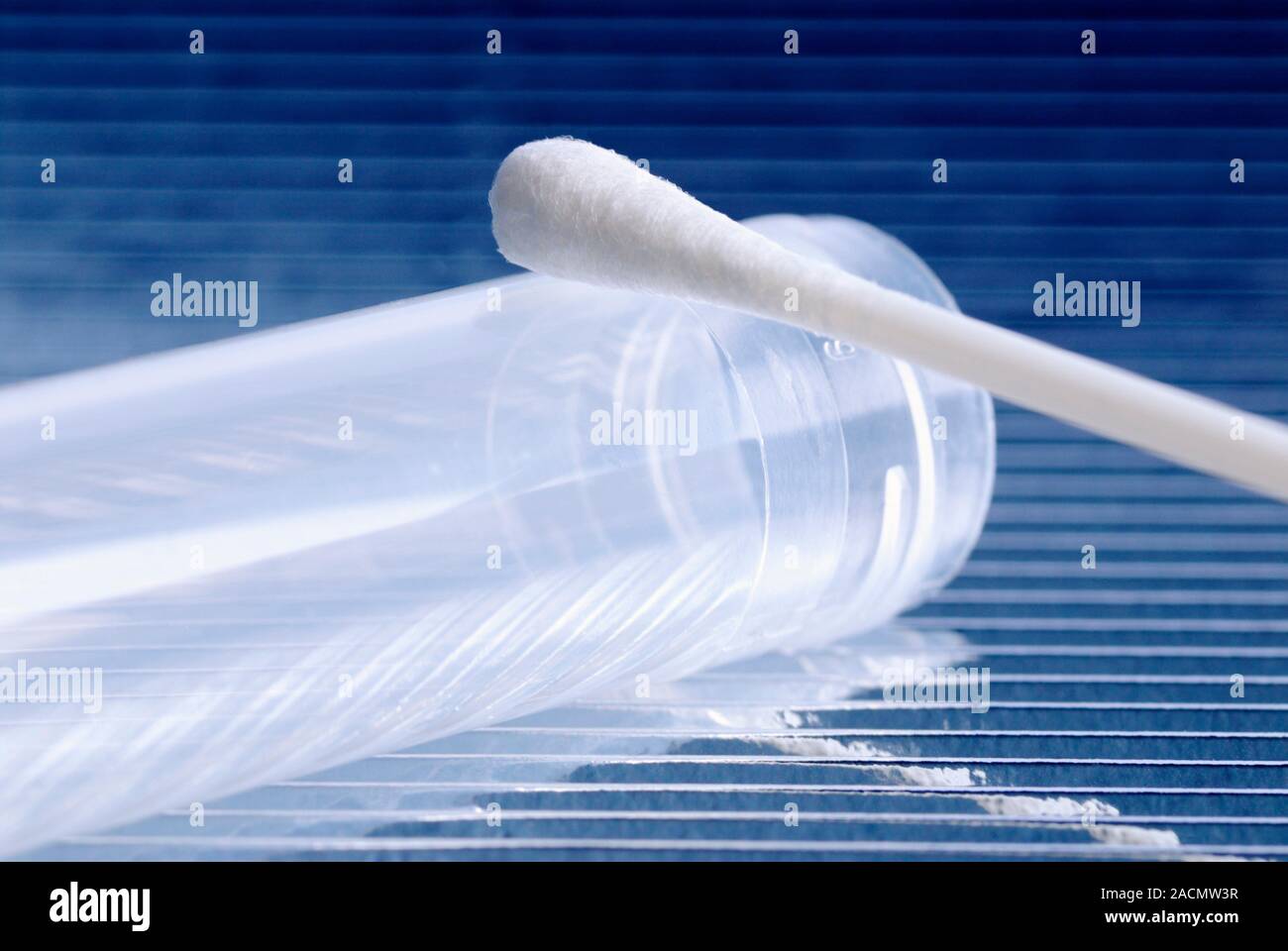 Genetic testing kit. Sterile cotton swab with a sample tube. The swab ...