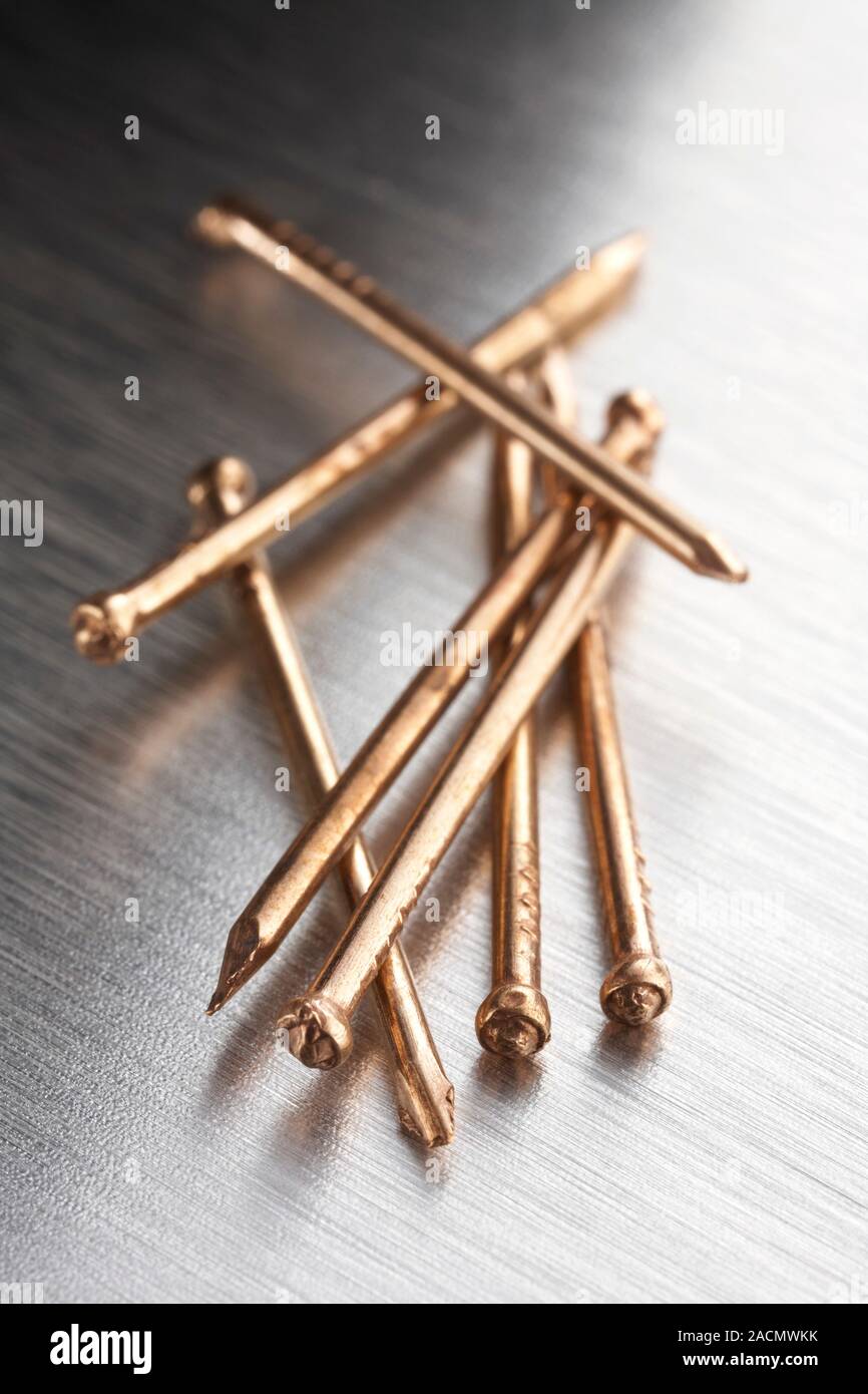 Copper nails. Copper (Cu) is a transition metal element. It is a soft ...