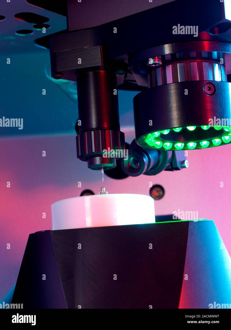 3D measurement machine. At centre is the probe head, and at right is ...