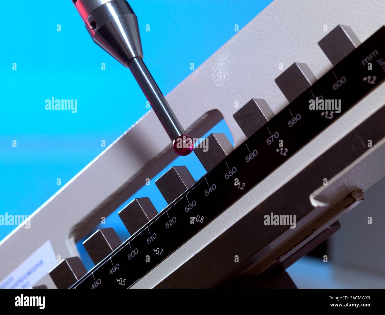 3D measurement probe use. Close-up of the probe head of a coordinate ...
