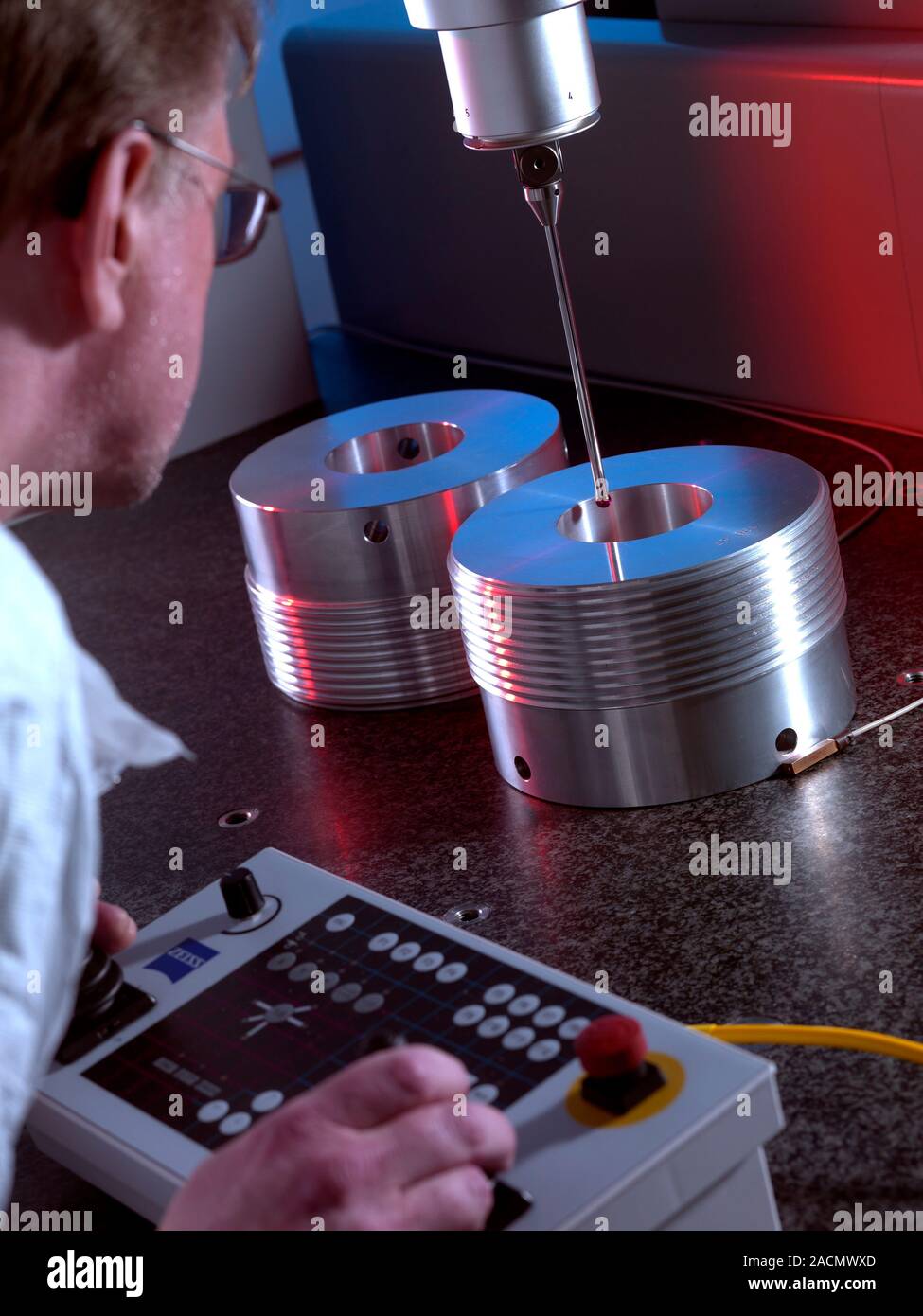 3D measurement machine use. Researcher using a coordinate measurement ...