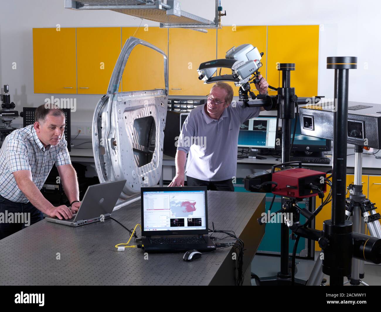 3D measurement machine use. Researchers using a coordinate measurement ...