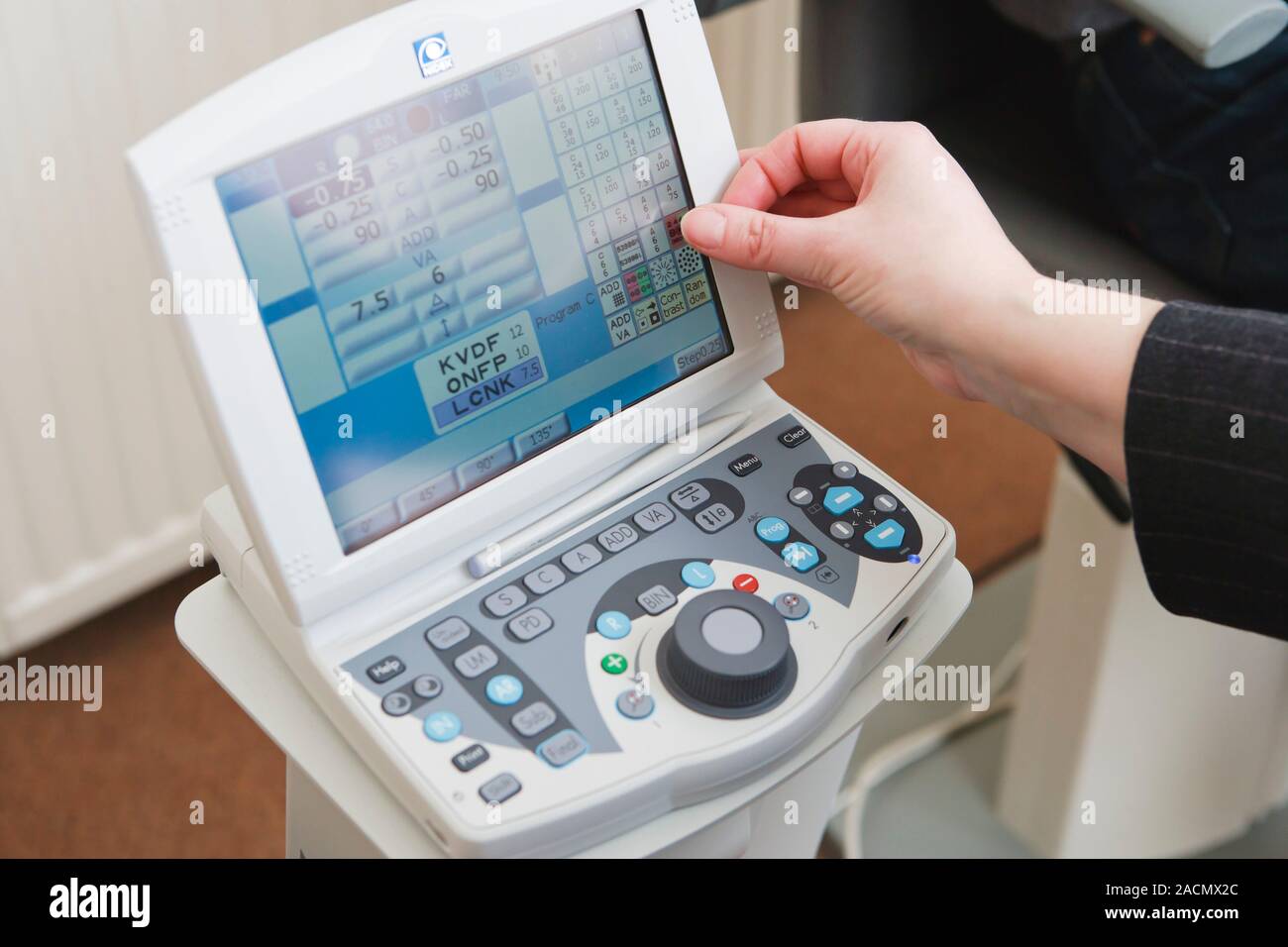 Refraction eye test equipment, monitor and controles Stock Photo - Alamy
