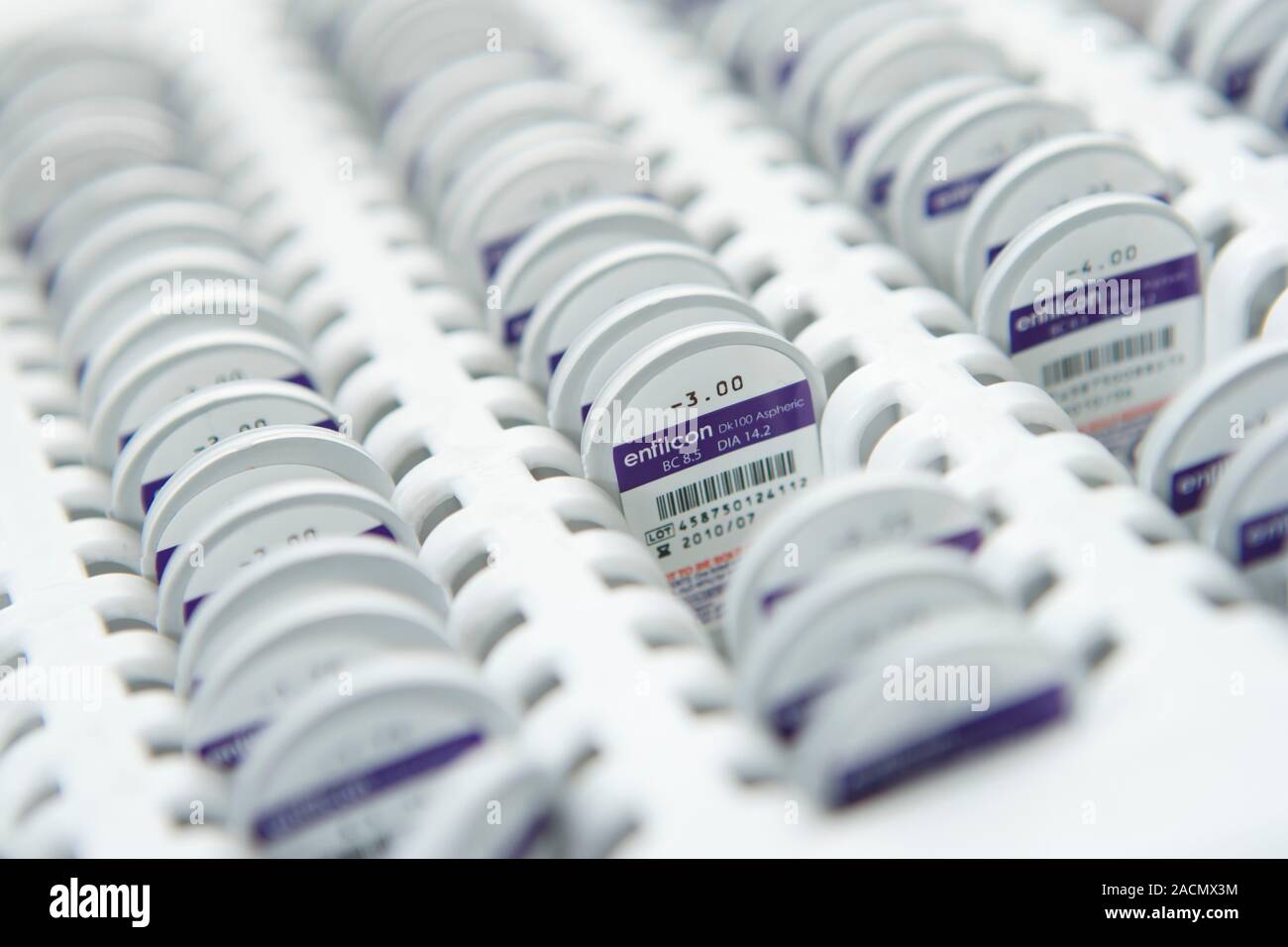 Row's of different strengths of eye test lenses Stock Photo - Alamy