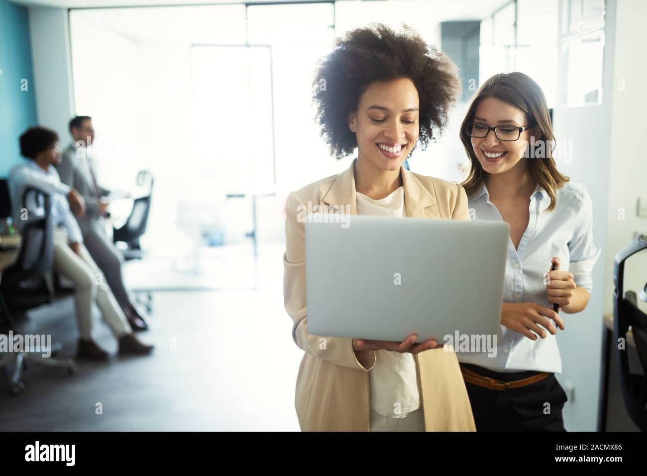 Successful business group of people at work in office Stock Photo - Alamy