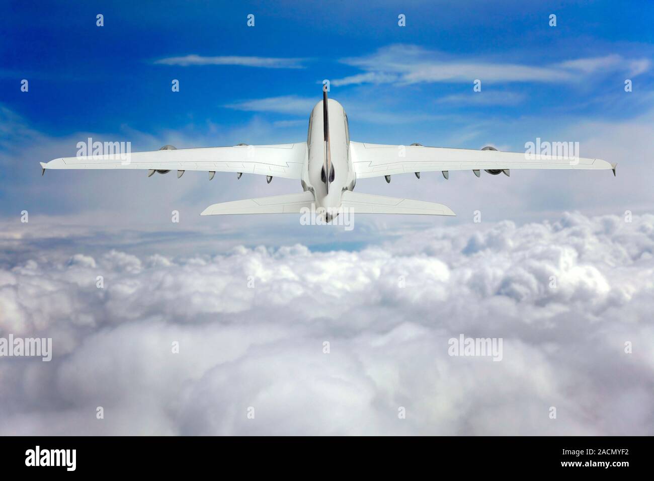 Aeroplane ascending above clouds, seen from behind. Commercial jet ...